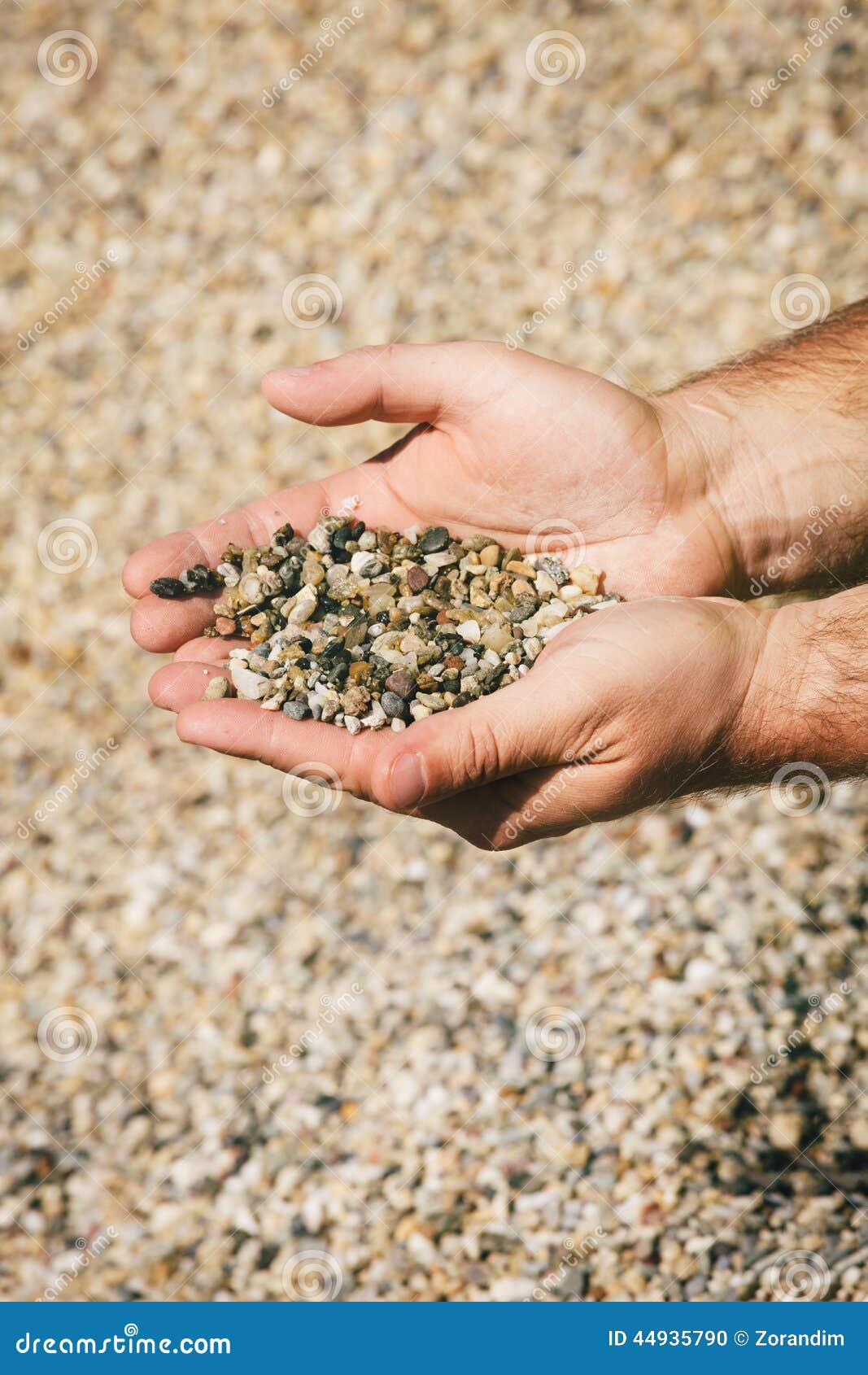 Handful of stones in hands stock photo. Image of harmony - 44935790