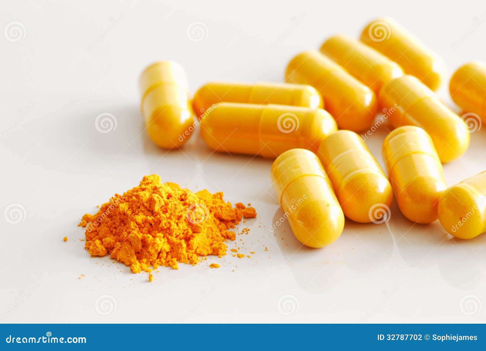 A Handful of Turmeric Capsules with the Contents of One Spilled Stock ...