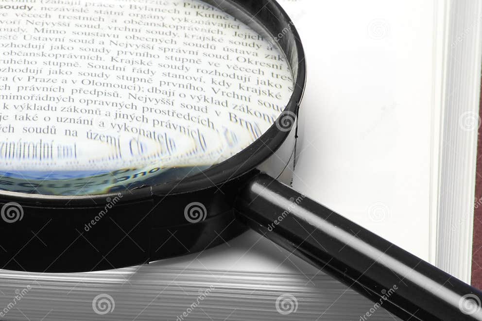 Handglass on a book stock image. Image of magnifying, magnifier - 2770505