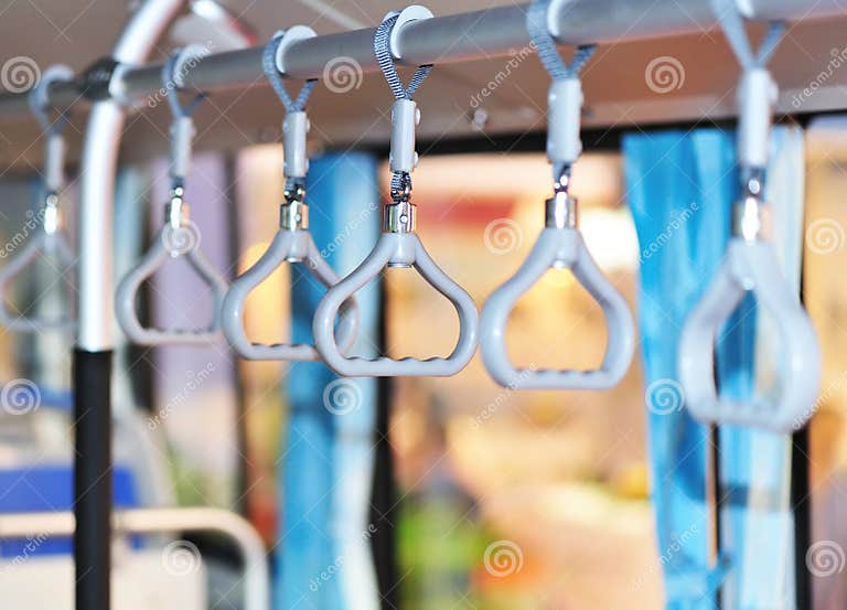 Handgrips in bus stock image. Image of interior, seat - 27212711
