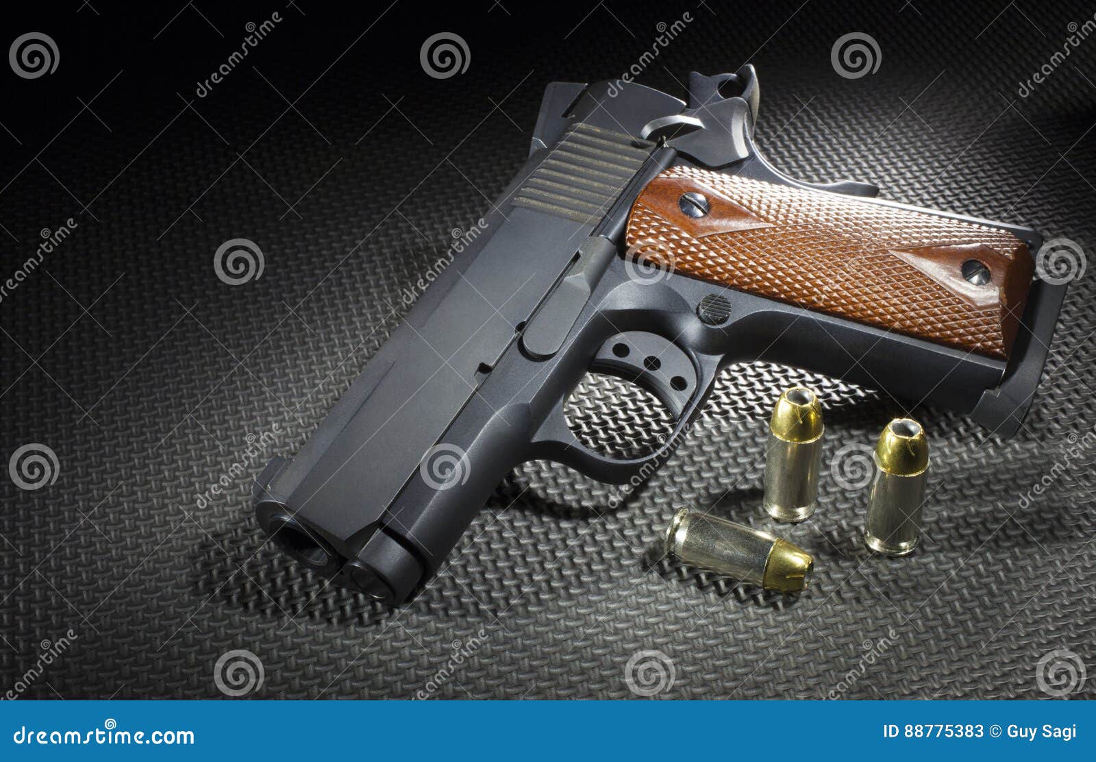 Handgun with bullets stock image. Image of sights, beige - 88775383