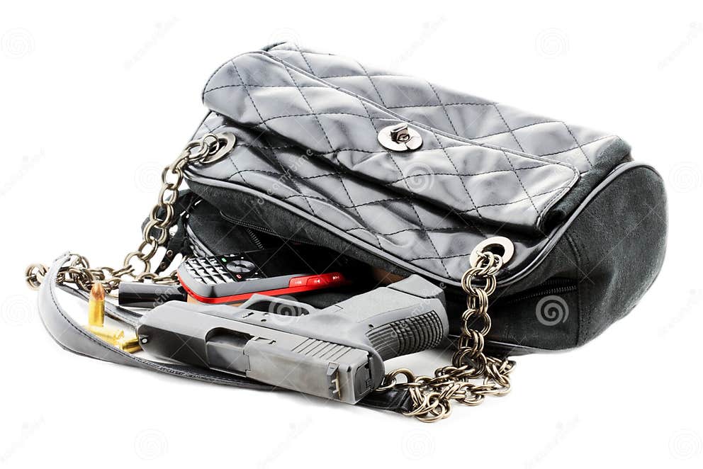 Handgun in Purse stock photo. Image of police, femininity - 15002614