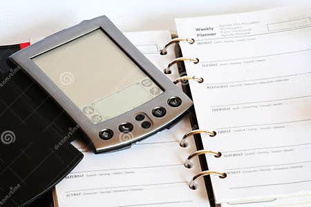 Handheld Computer and Planner Stock Photo - Image of scheduler, time ...
