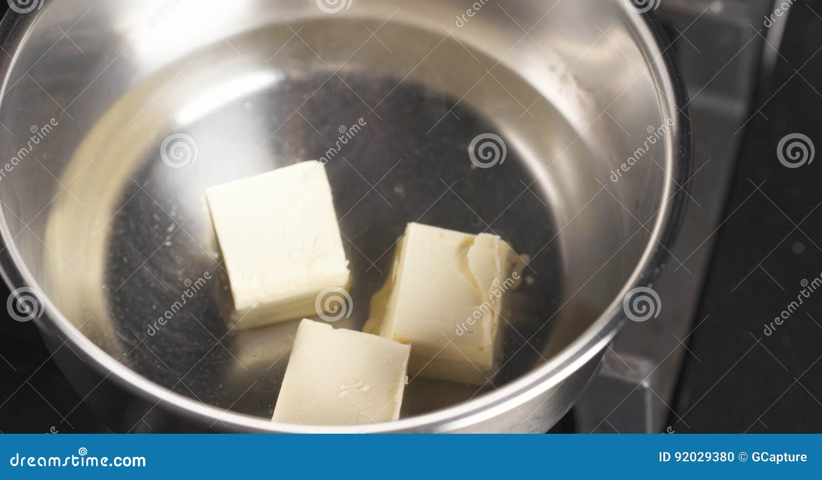 Handheld Shot of Adding Butter into Water Stock Photo - Image of ...
