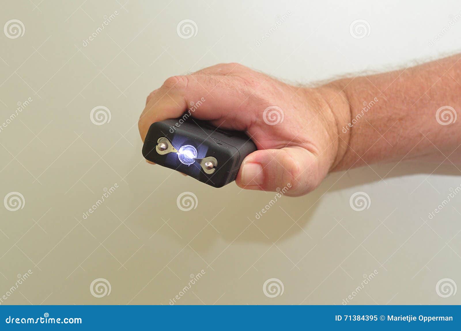 A handheld taser stock image. Image of electric, portable - 71384395