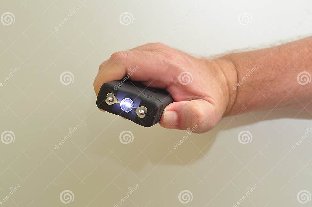 A handheld taser stock image. Image of electric, portable - 71384395
