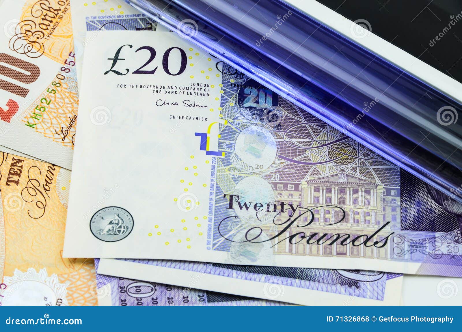 Handheld Ultraviolet light editorial stock photo. Image of banknotes ...