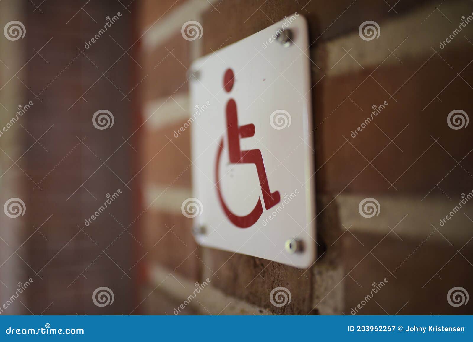 Handicap Sign on Building Wall Stock Image - Image of wall, middle ...