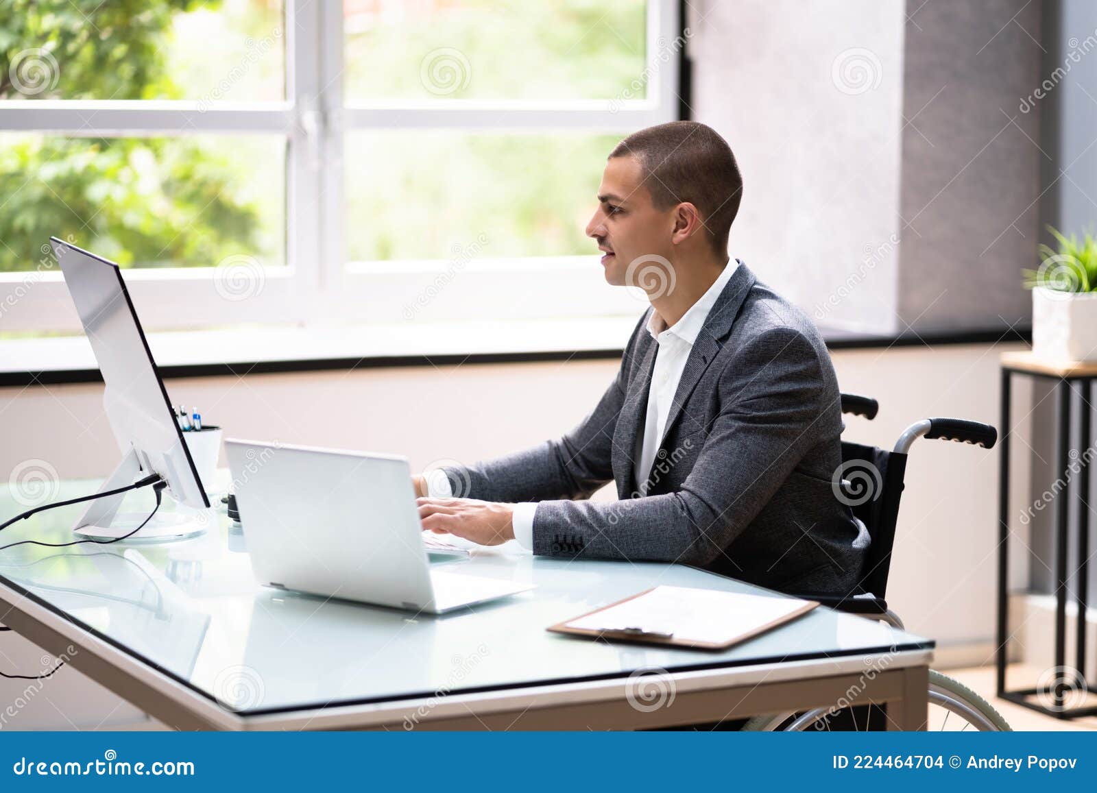 Handicapped Businessman Using Laptop Computer Stock Photo - Image of ...