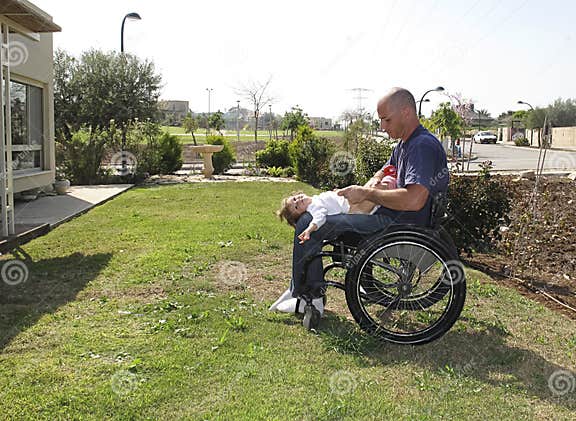 Handicapped dad with child stock image. Image of daughter - 25415037