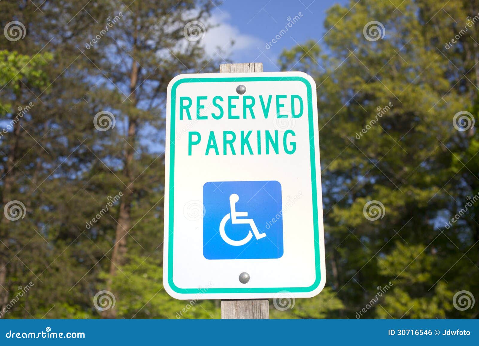 Handicapped Reserved Parking Sign Stock Photo - Image of chair, leafy ...