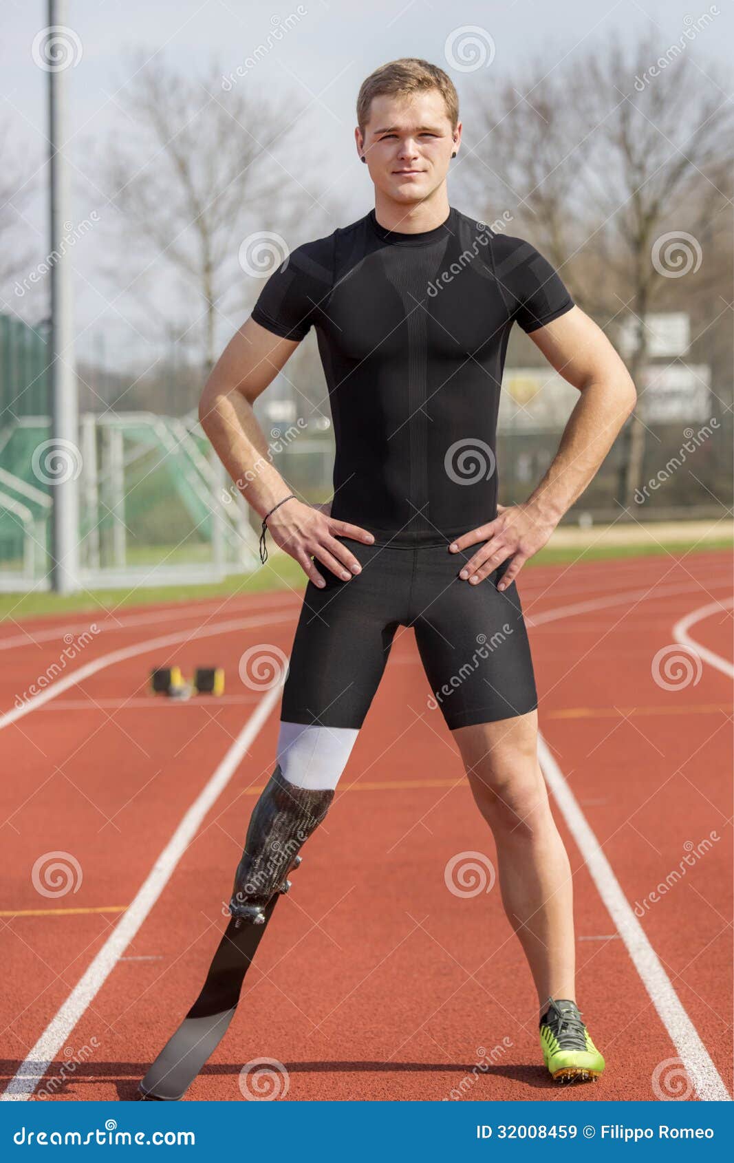Handicapped Sprinter Standing Track Photos - Free & Royalty-Free Stock ...