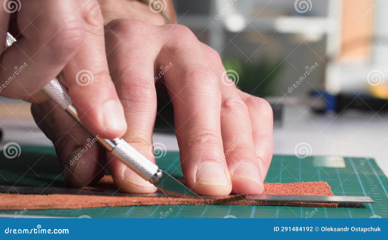 Handicraft, Man Using Sewing Tools Cuts Off a Piece of Leather To Make ...