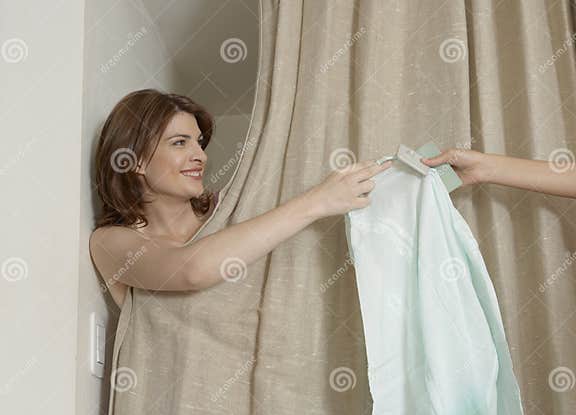 Handing on Clothes stock image. Image of outfits, shop - 25466069