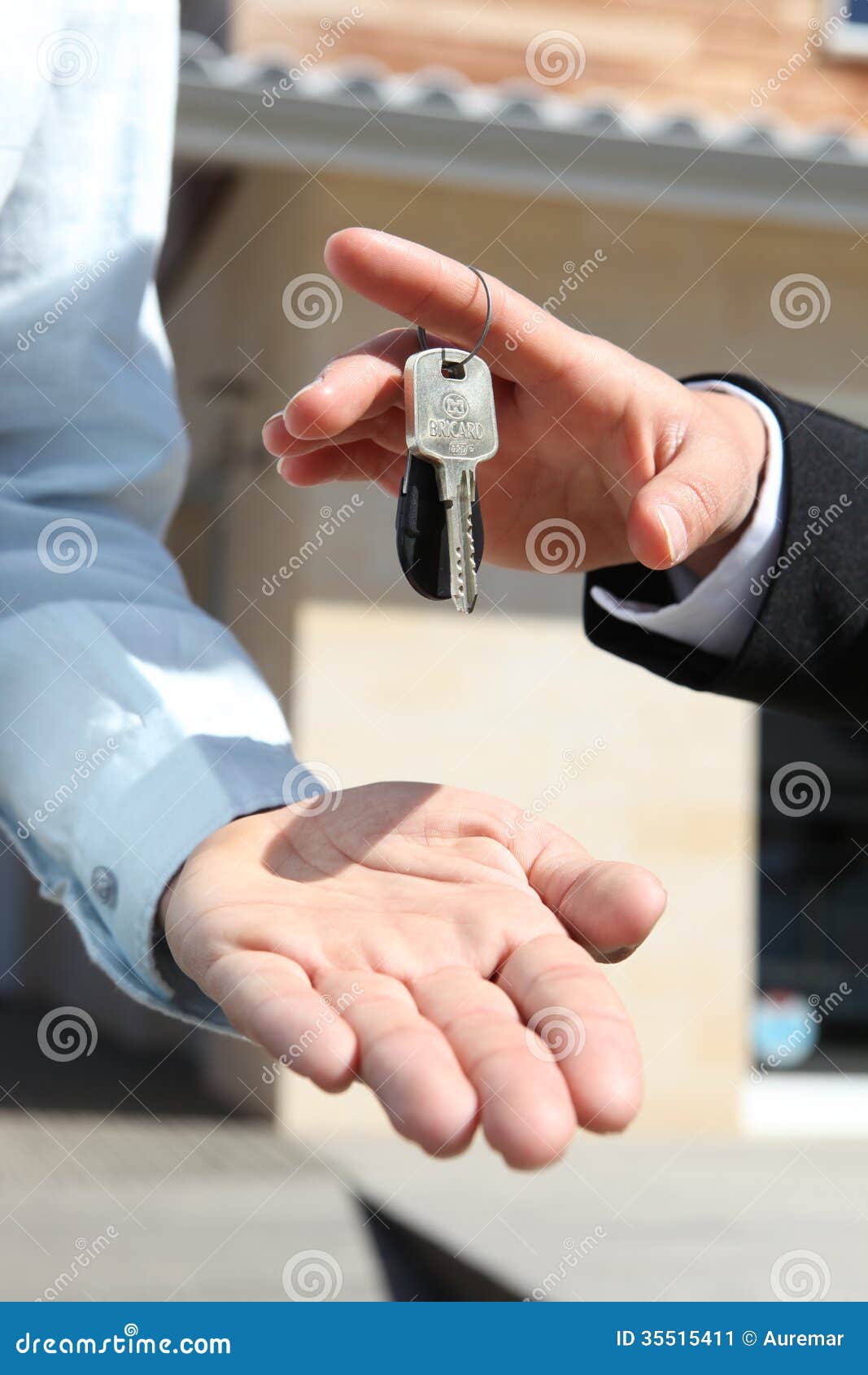 Handing over house keys stock image. Image of property - 35515411