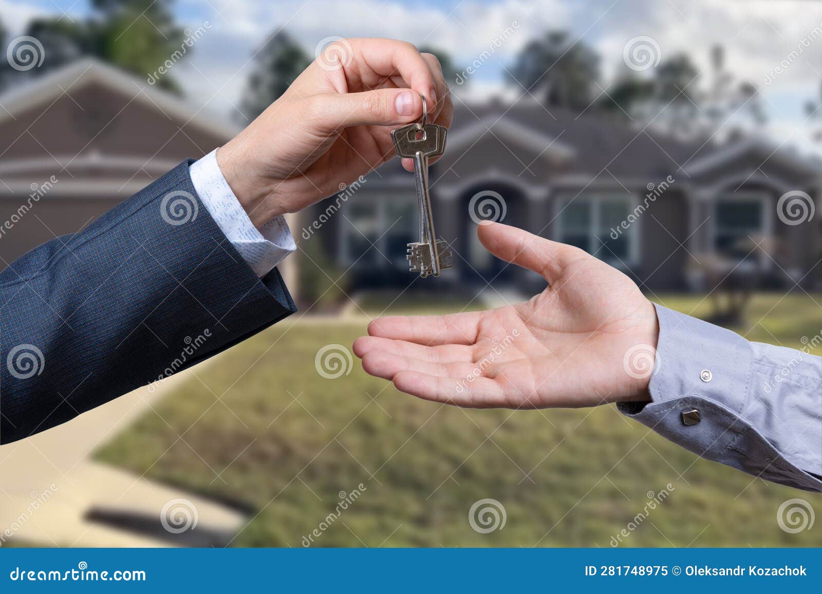 Handing Over the House Keys in Front of a Beautiful New Home. Stock ...