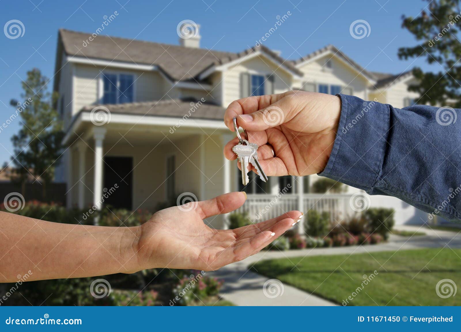 Handing Over the House Keys in Front of New Home Stock Photo - Image of ...