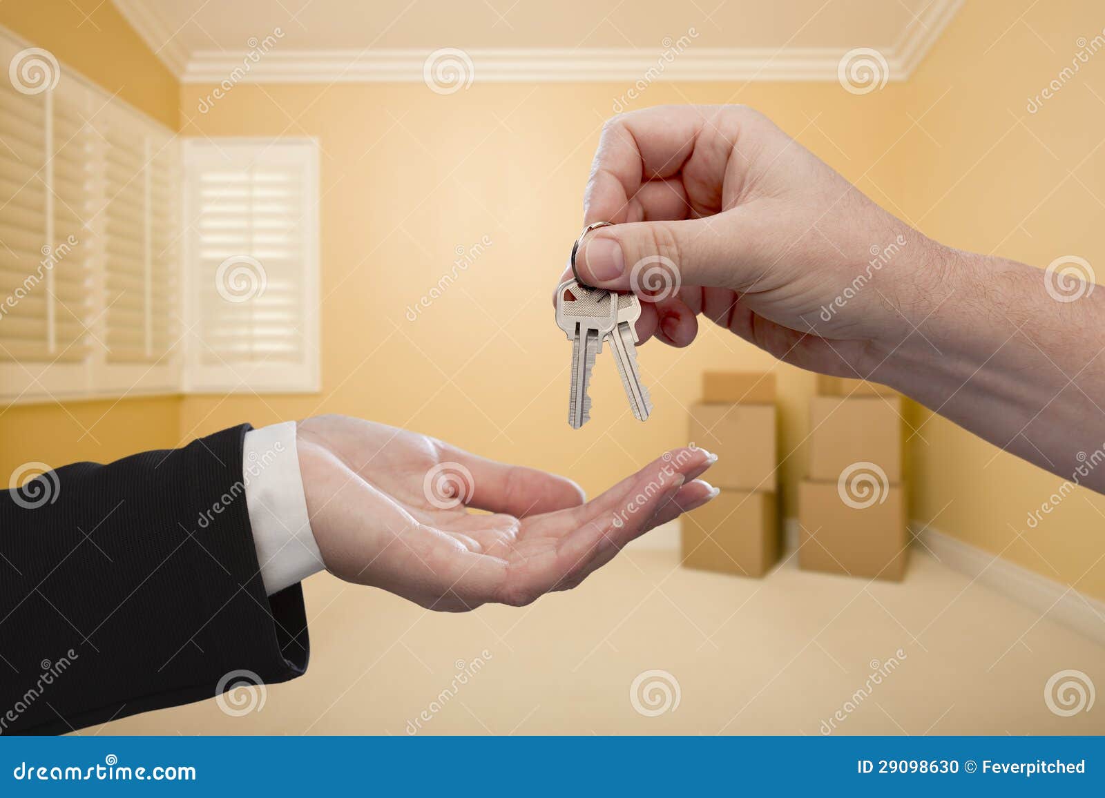 Handing Over The House Keys Inside Empty Room Stock Photo - Image: 29098630