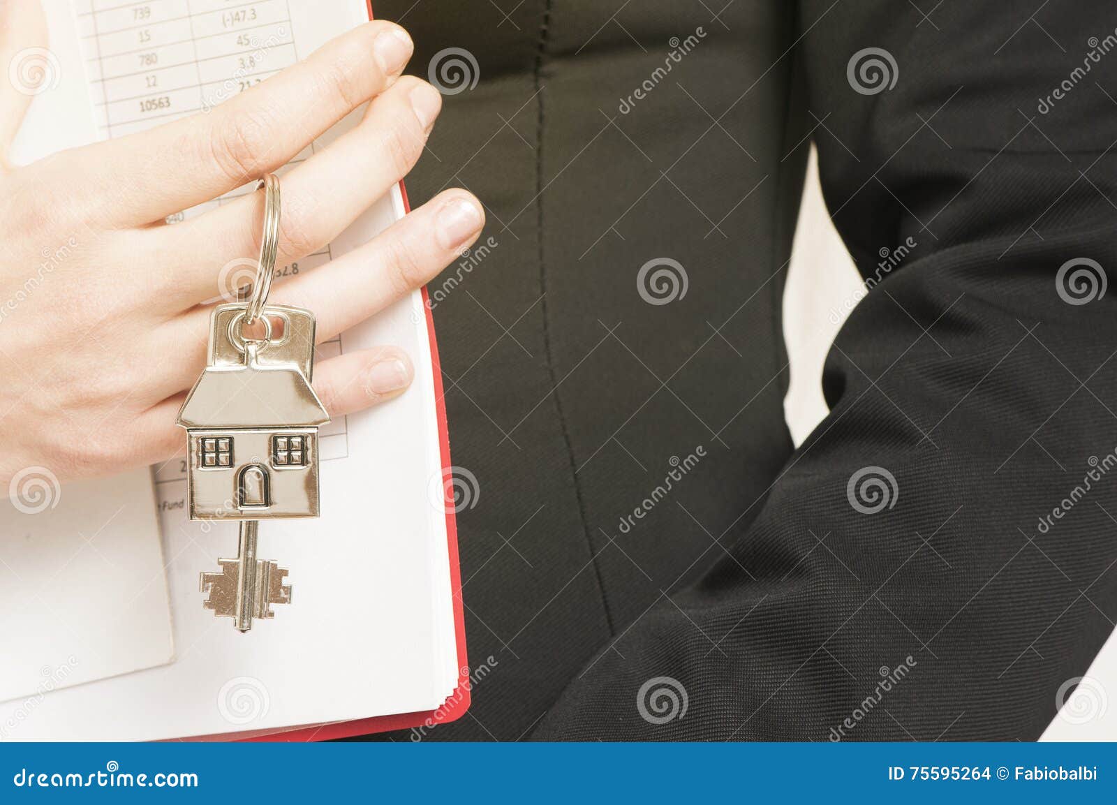 Handing over house keys stock photo. Image of contract - 75595264