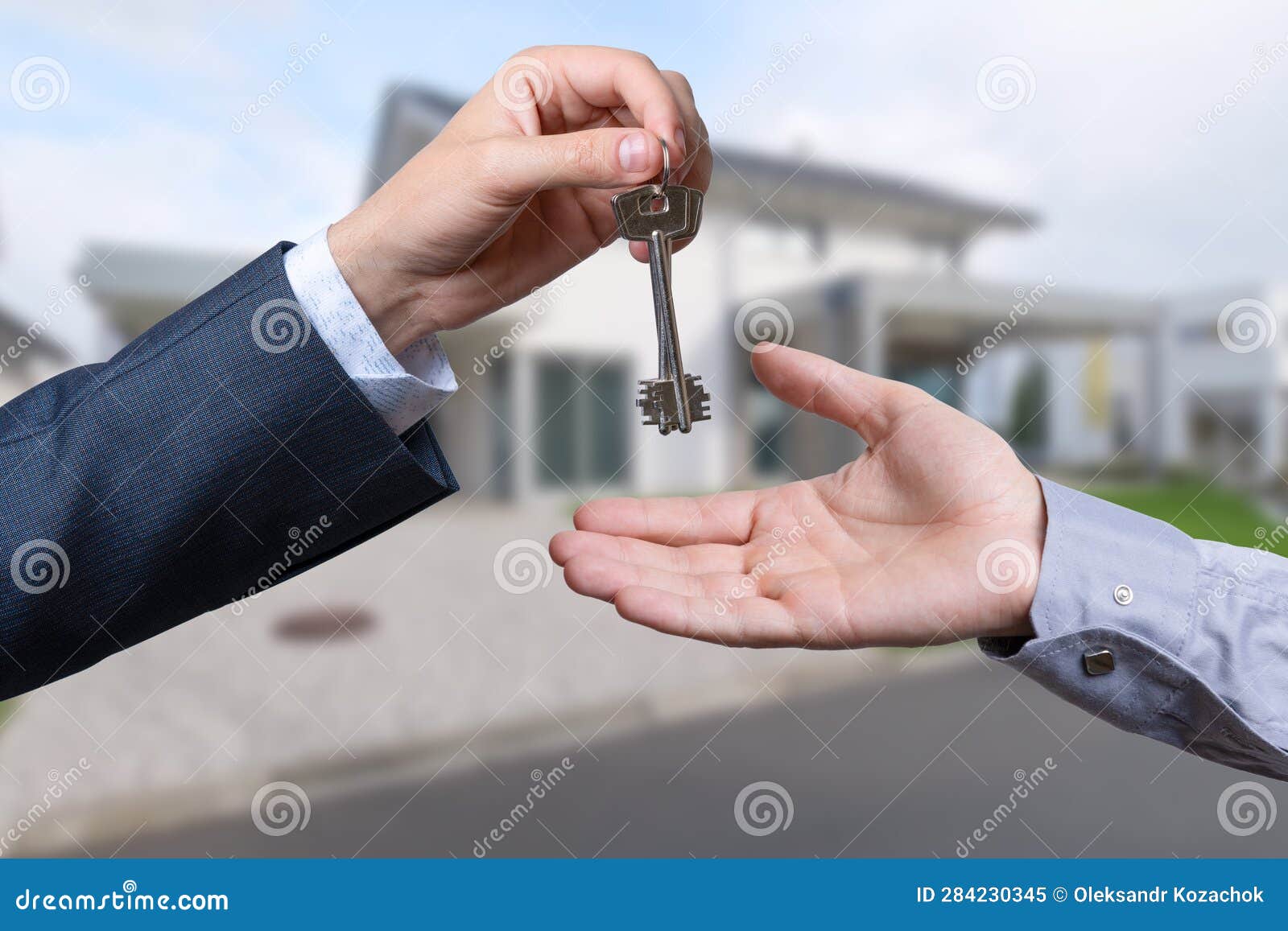 Handing Over the New House Keys with Home in the Background. Stock ...