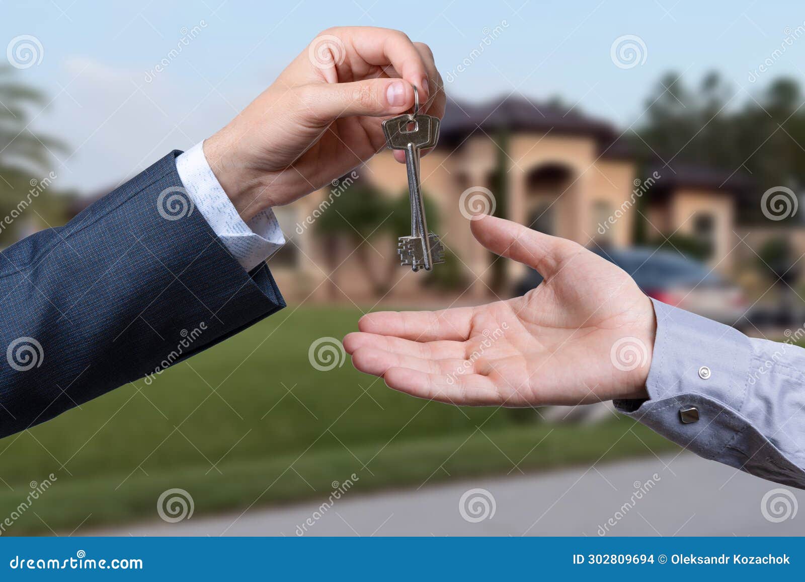 Handing Over the New House Keys with Home in the Background. Stock ...
