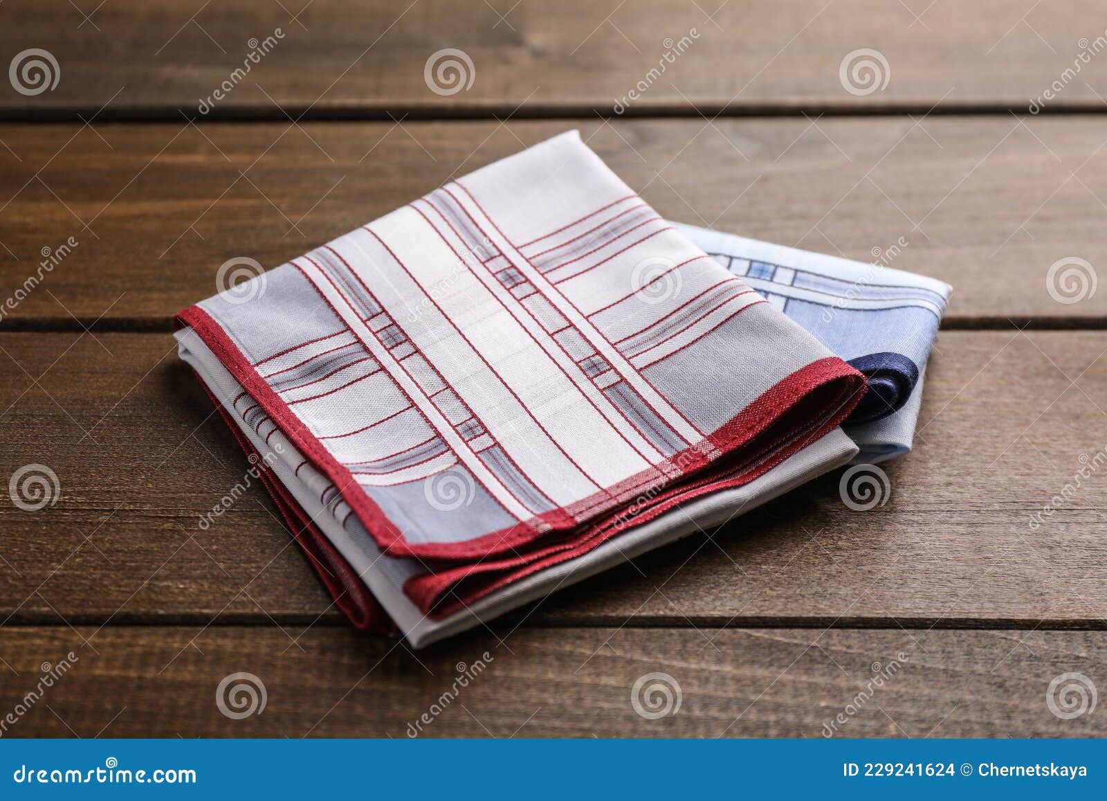 Handkerchiefs with Patterns Folded on Wooden Table Stock Photo - Image ...