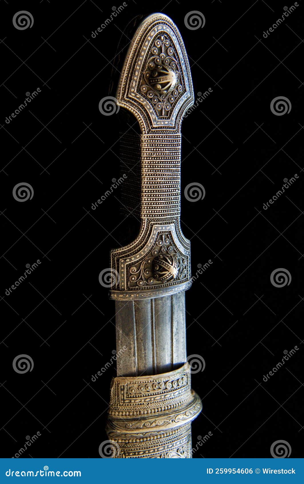 Handle of an Antique Dagger with Artistic Chasing and Engraving on a ...