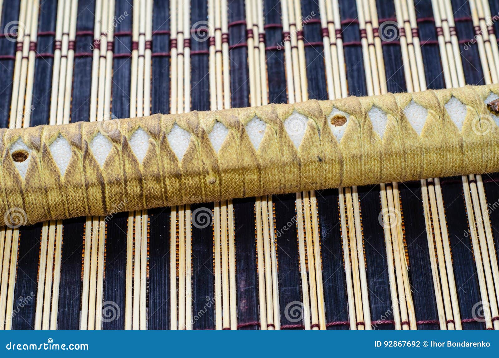 Handle of the Japanese Sword Katana on Bamboo Mat Stock Photo - Image ...