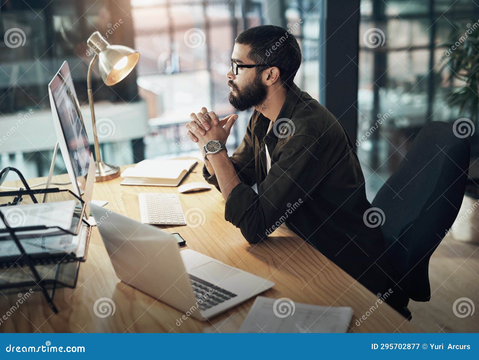 Handling Business with Razor Sharp Focus. a Young Businessman Using a ...