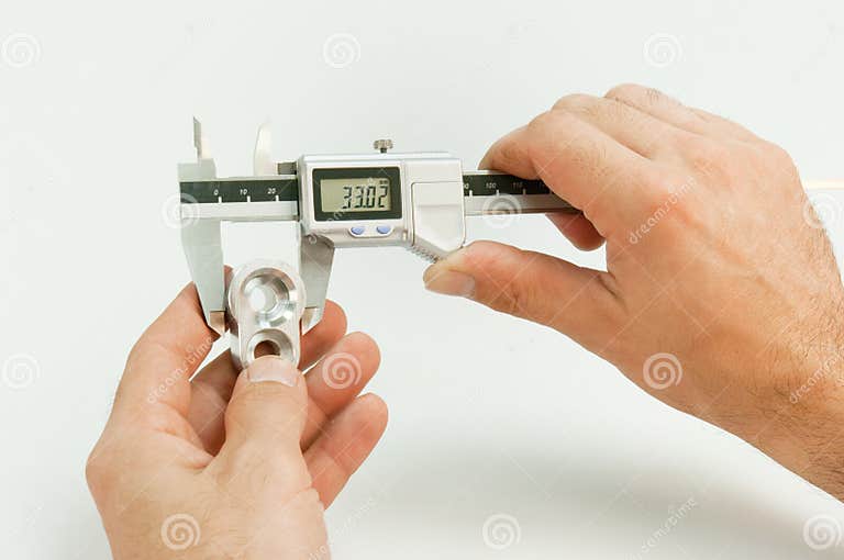 Handling of a caliper stock image. Image of industry - 17611637