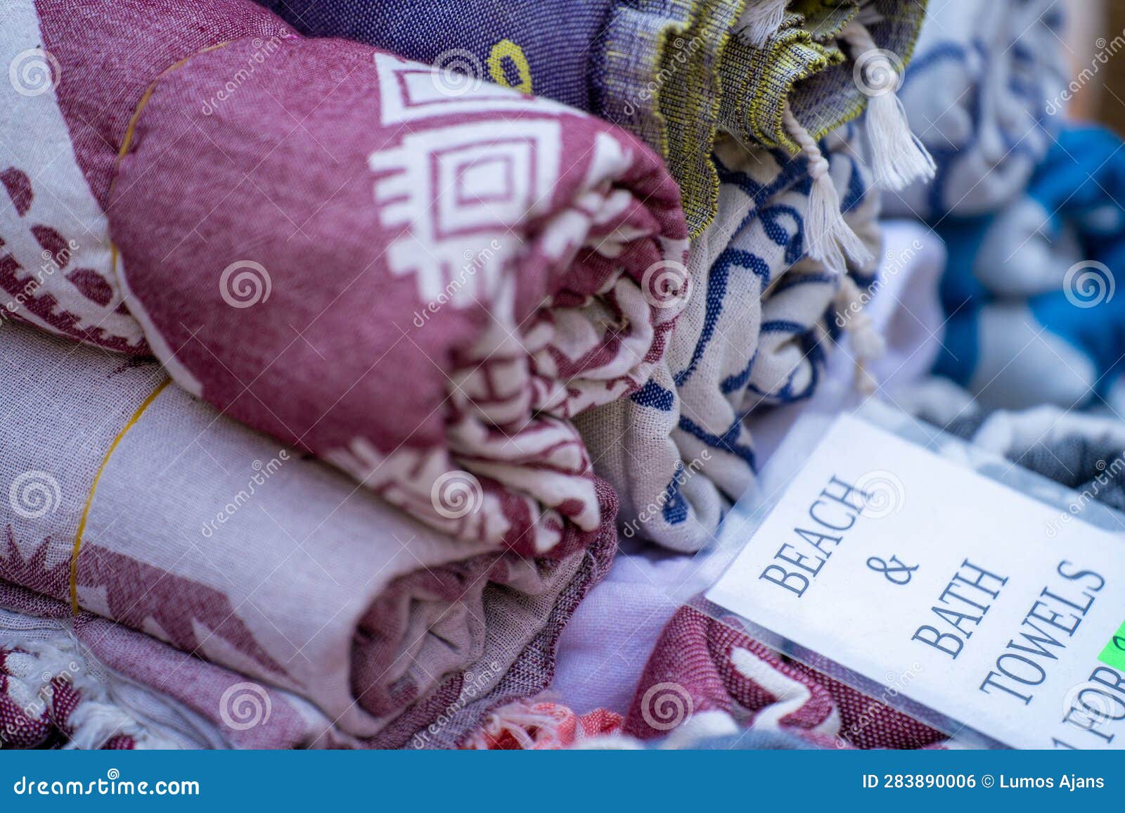Handmade Beach and Bath Towels on the Counter in the Market Stock Photo ...