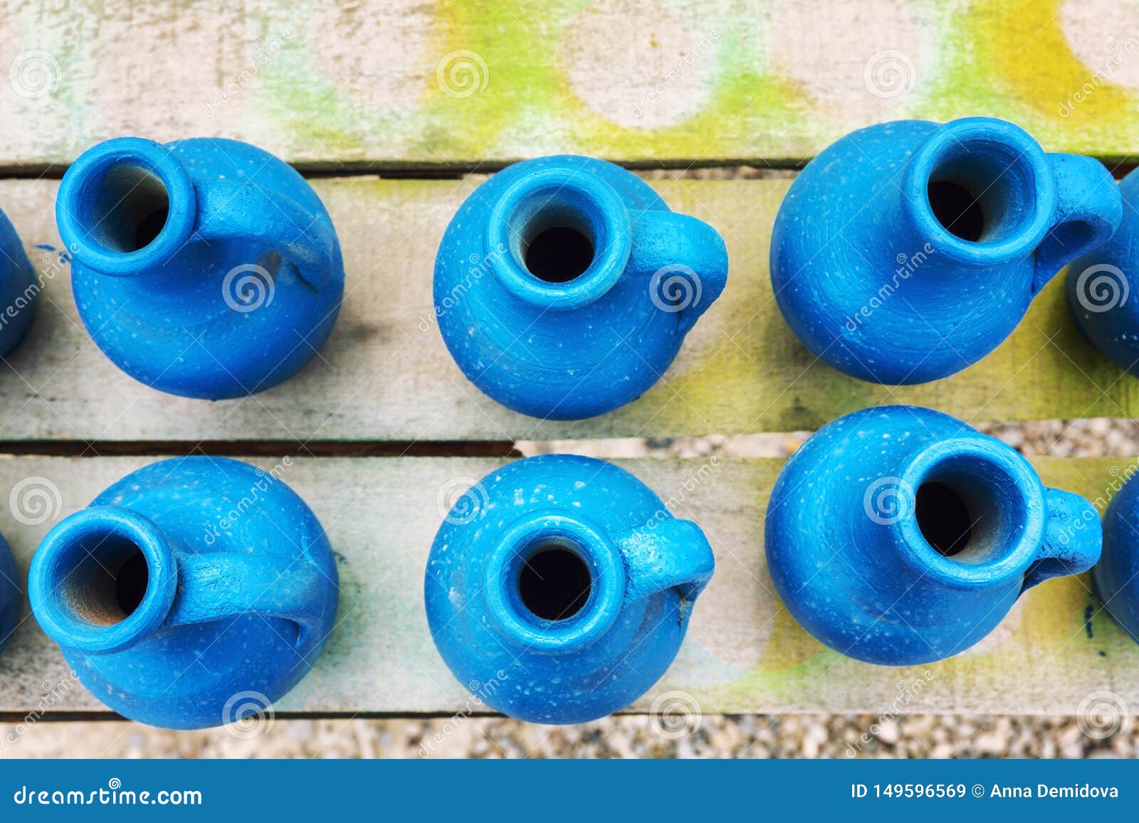 Handmade Blue Pitchers on a Wooden Table. Top View Stock Image - Image ...