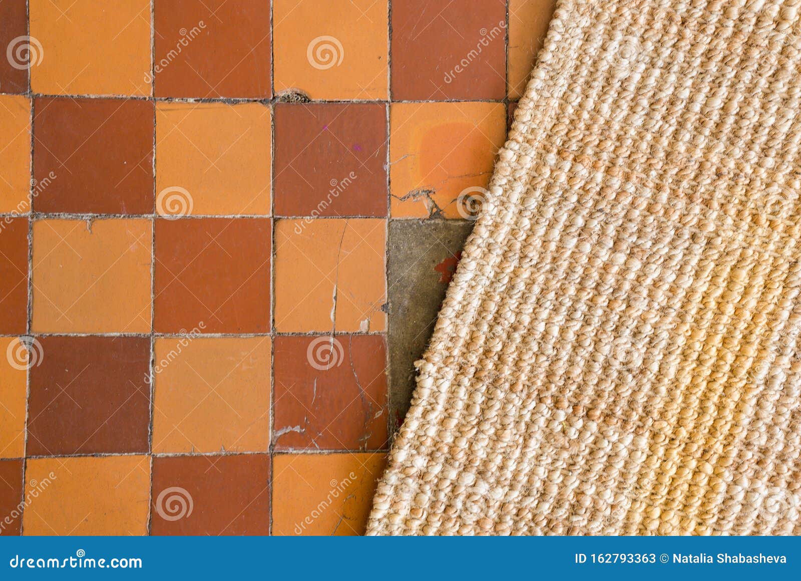 Handmade Carpet on Tiled Checkered Floor, Carpet on the Floor Stock ...