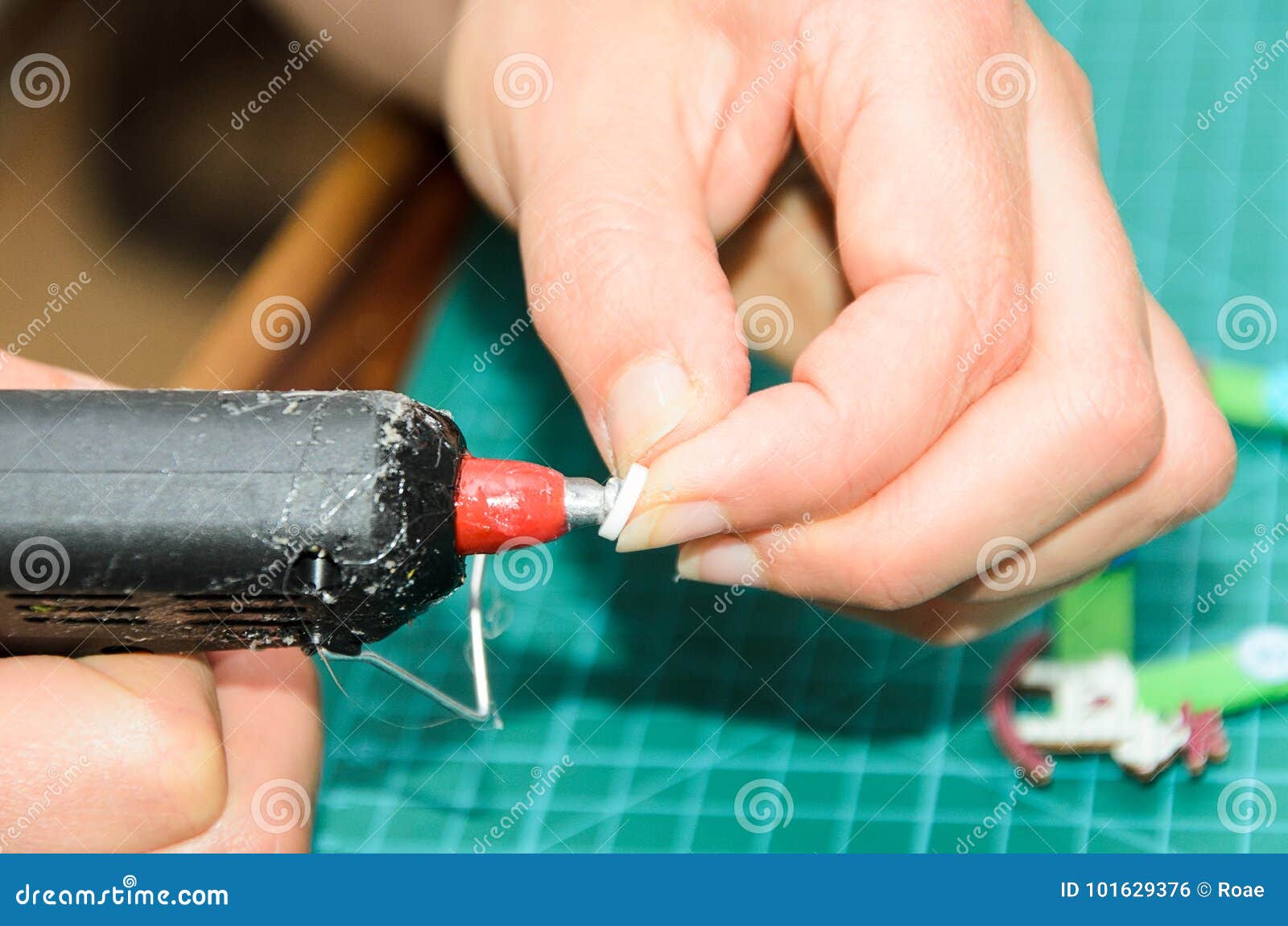 Man Using Heat Press Machine At Table Near Brick Wall, Closeup Stock ...