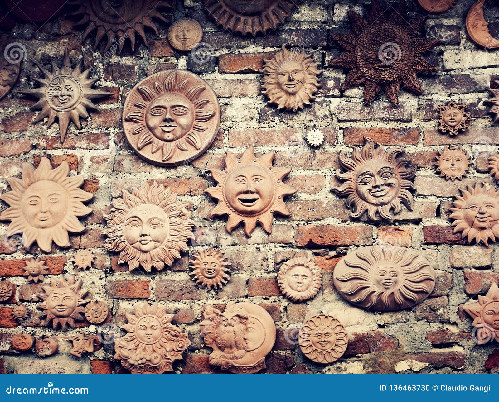 Handmade Collection of Terracotta Sun Decoration Stock Photo - Image of ...