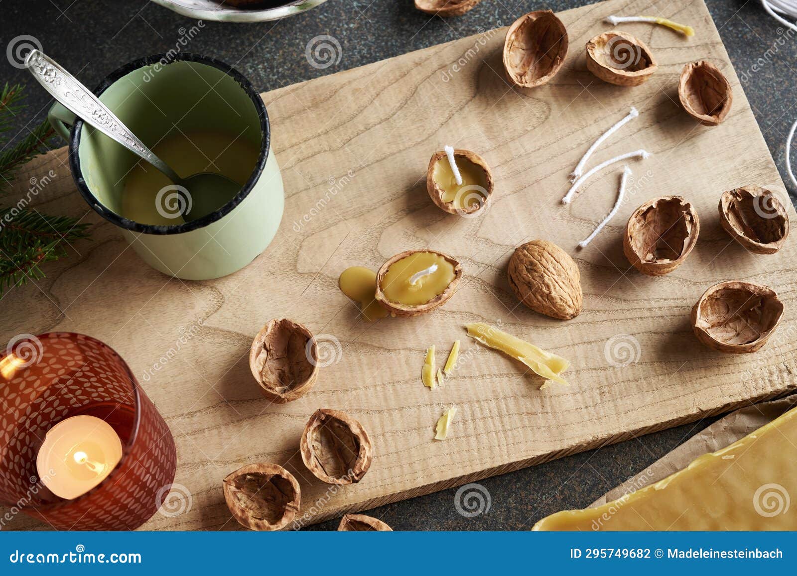 Handmade Fabrication of Christmas Candles from Melted Bees Wax and Nut ...