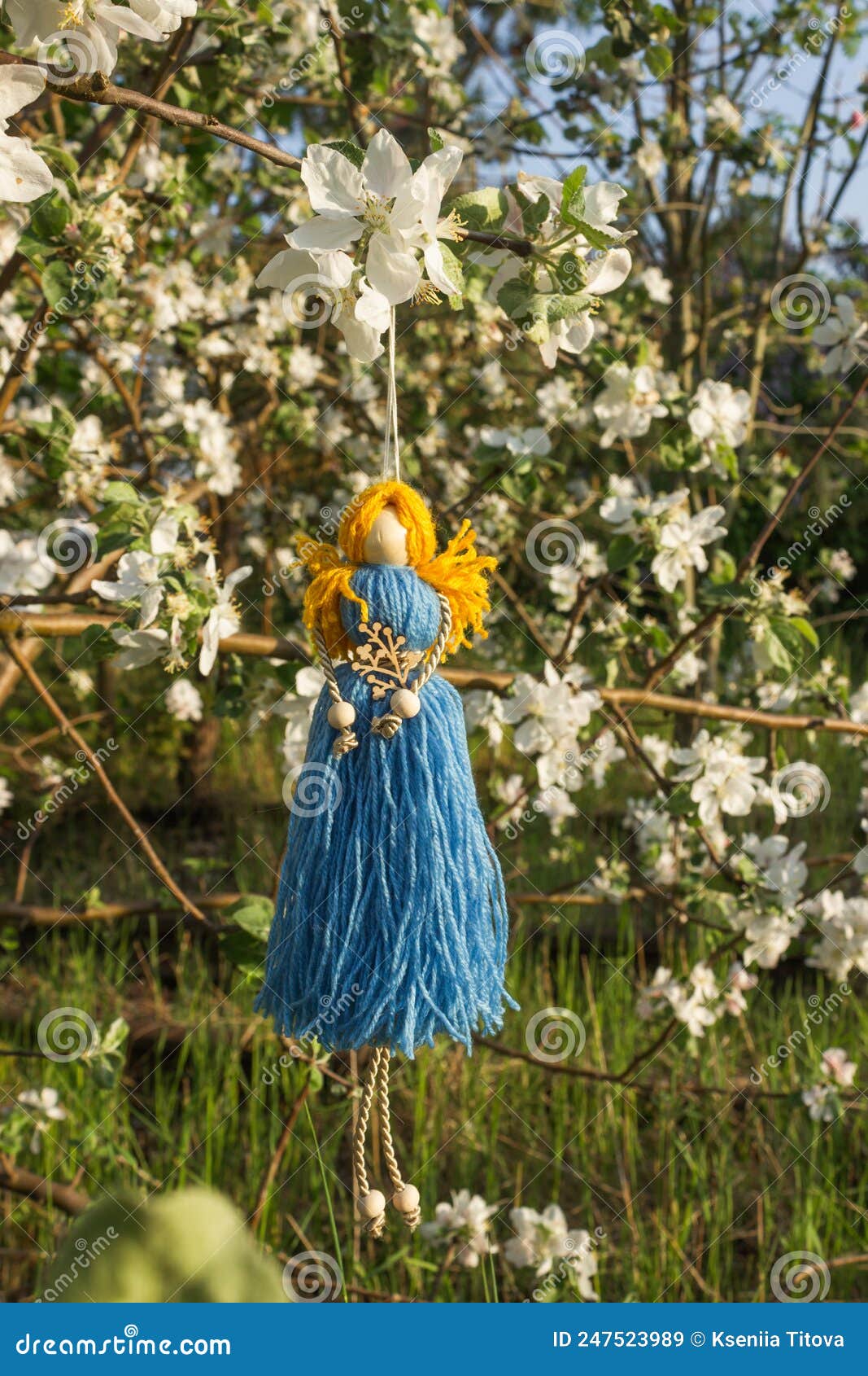 Handmade Faceless Doll Knitted from Blue and Yellow Threads. Macrame ...