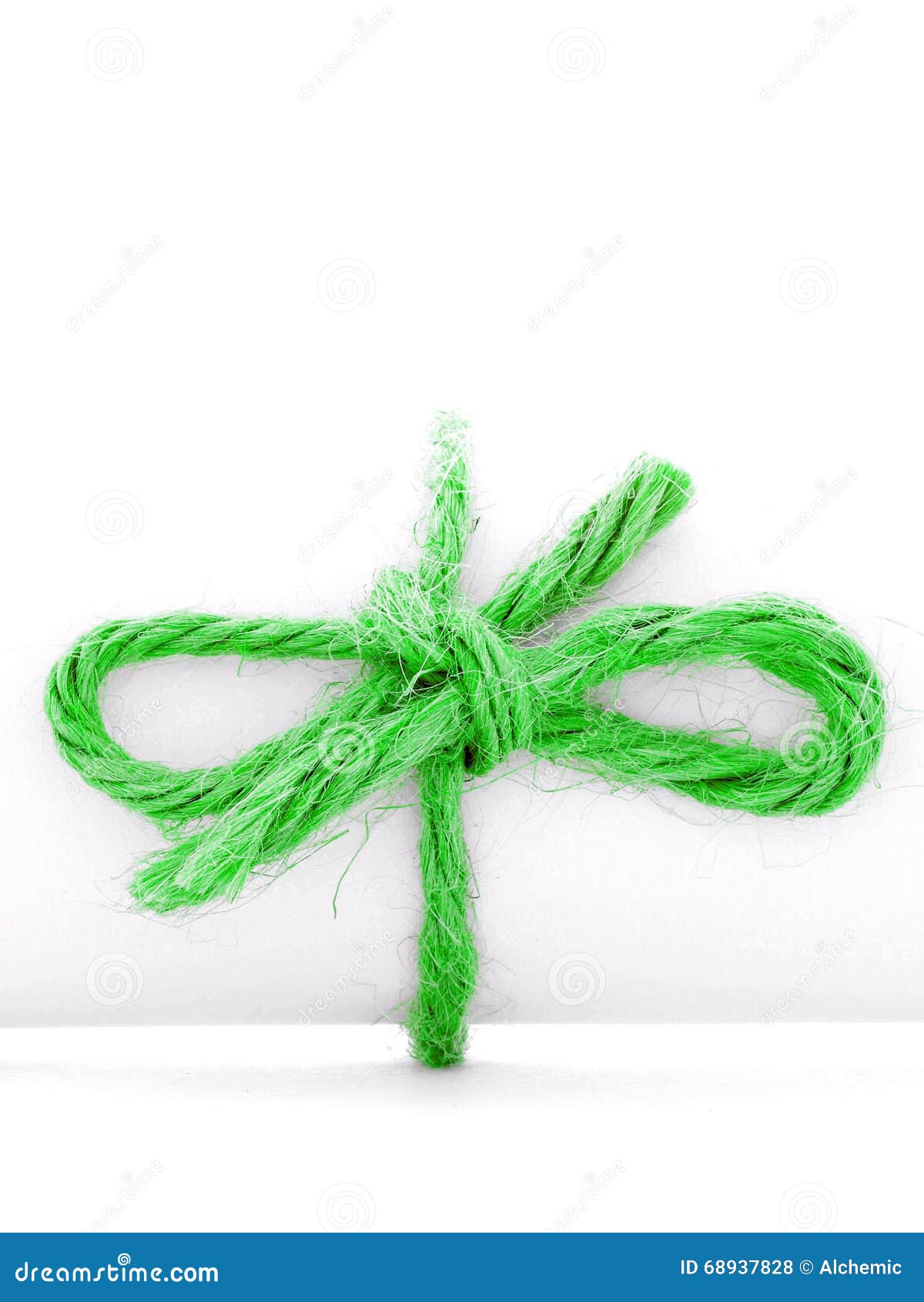 Handmade Green Cord Knot Tied on White Message Scroll Isolated Stock ...