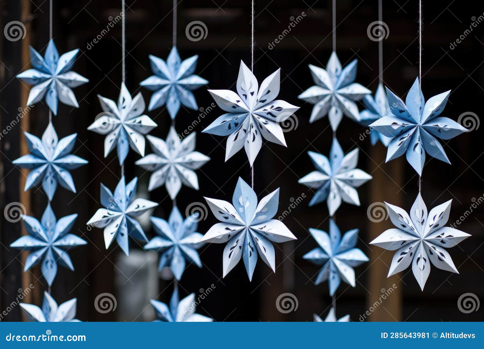 Handmade Paper Snowflakes Hanging on a String Stock Image - Image of ...