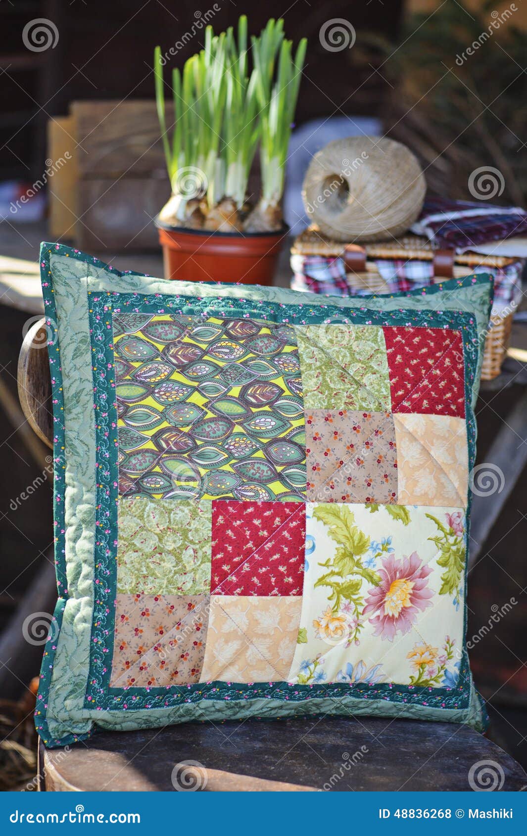 Handmade Patchwork Cushion with Narcissus Bulbs on Background Stock ...