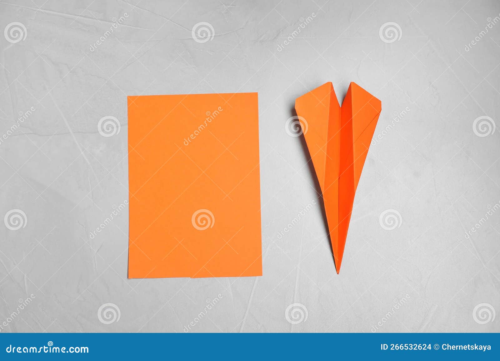 Handmade Plane and Piece of Paper on Light Grey Table, Flat Lay Stock ...