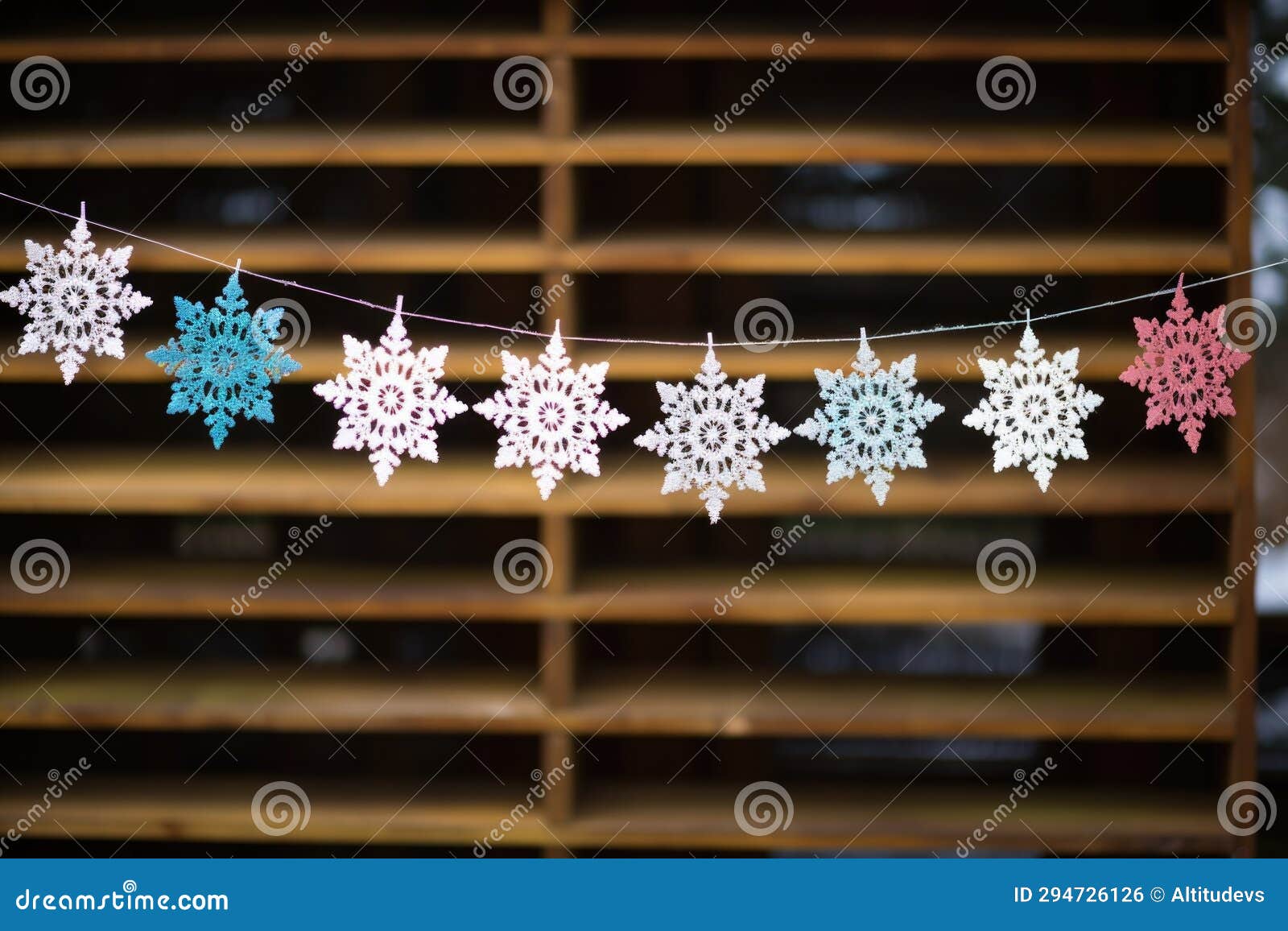 Handmade Snowflake Decorations Hanging on a Line Stock Photo - Image of ...