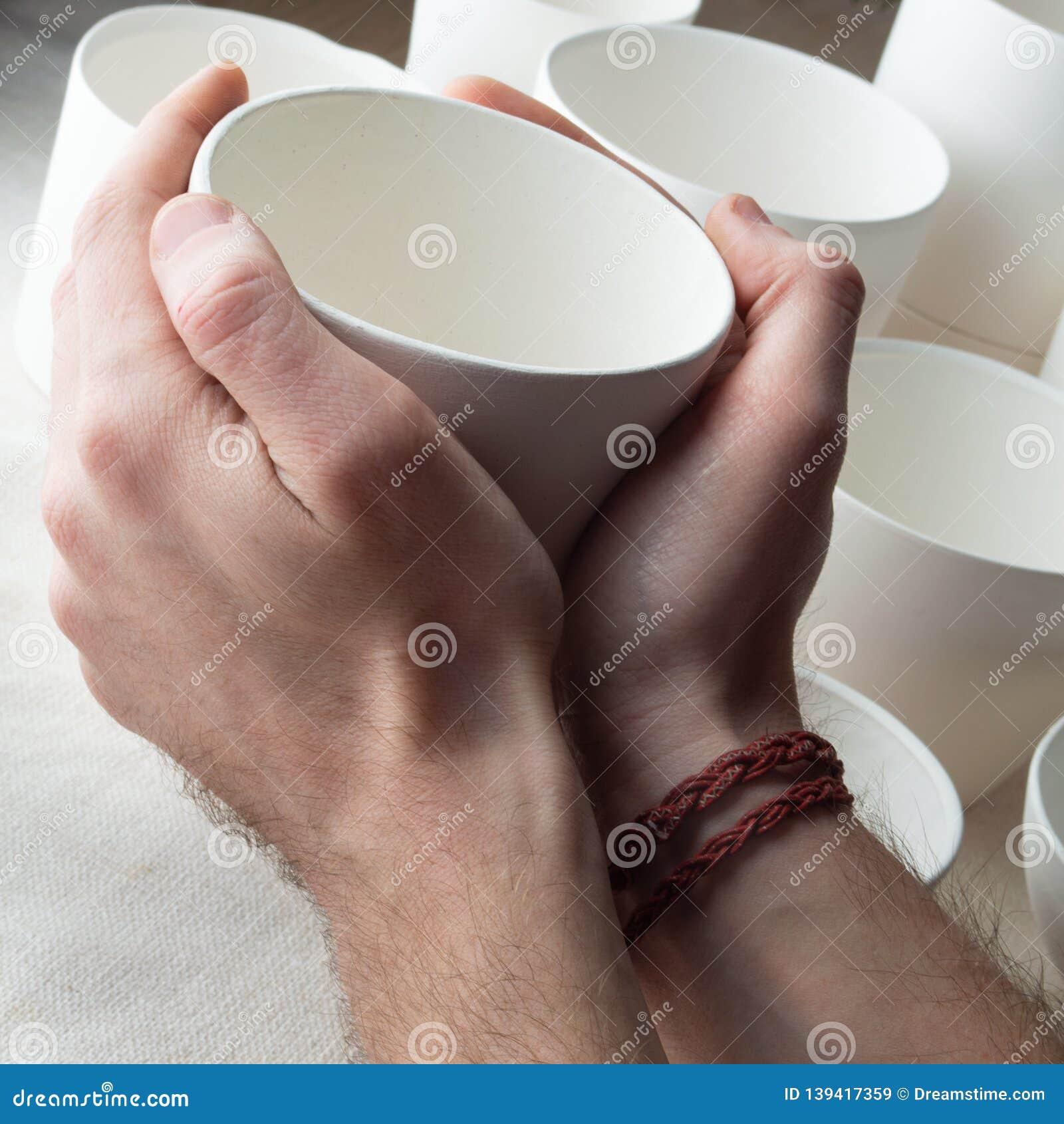 Handmade White Clay Ceramic Cups on Rag Linen Background Stock Image ...