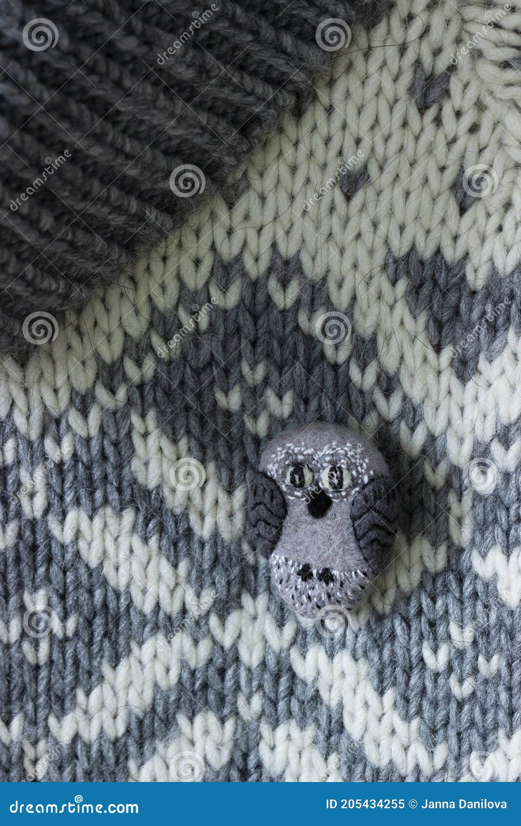Handmade Wool Brooch on a Sweater Background. Selective Focus. Stock ...