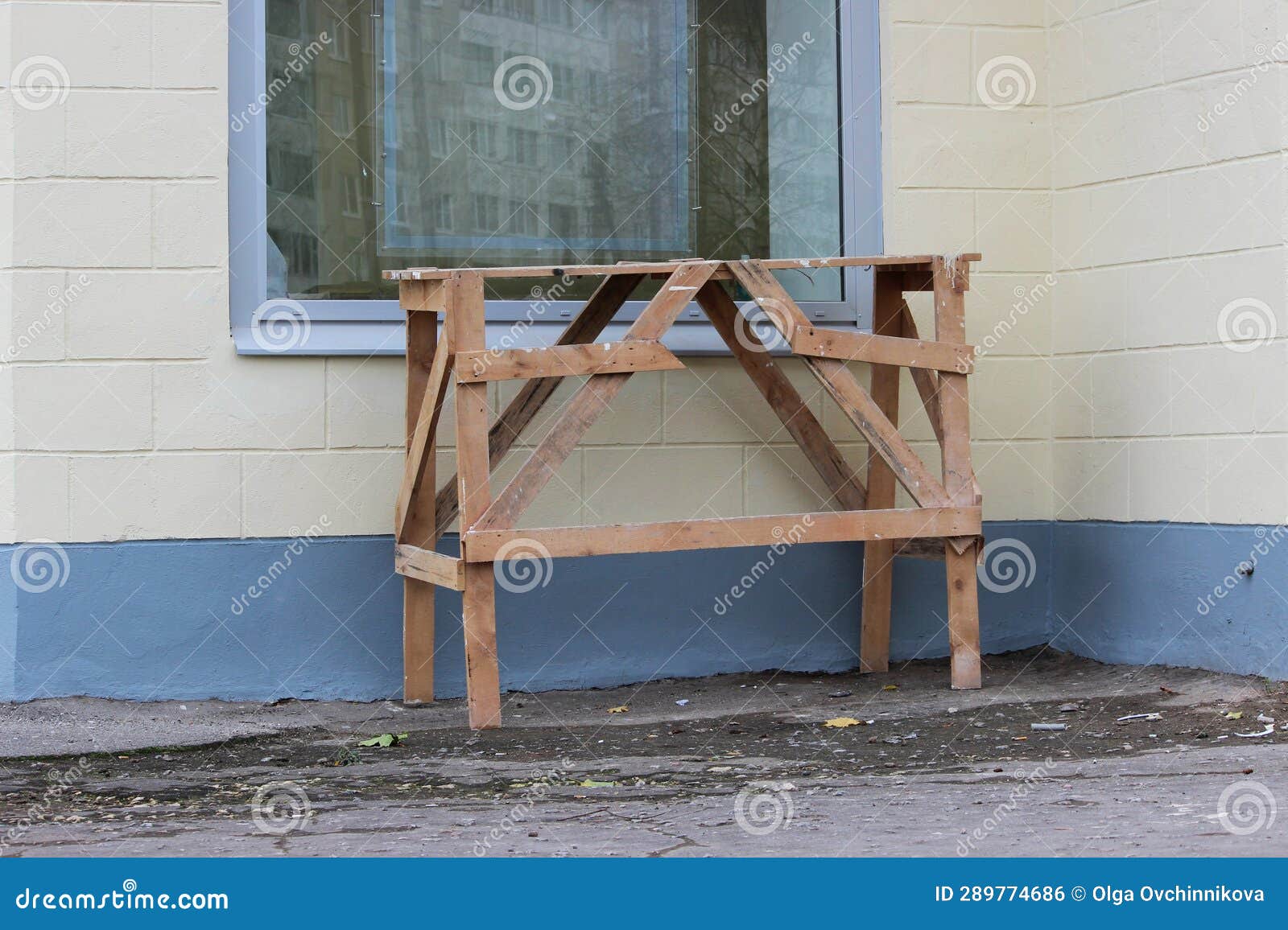 Handmade Work Bench on a Construction Site Against a Beige and Blue ...