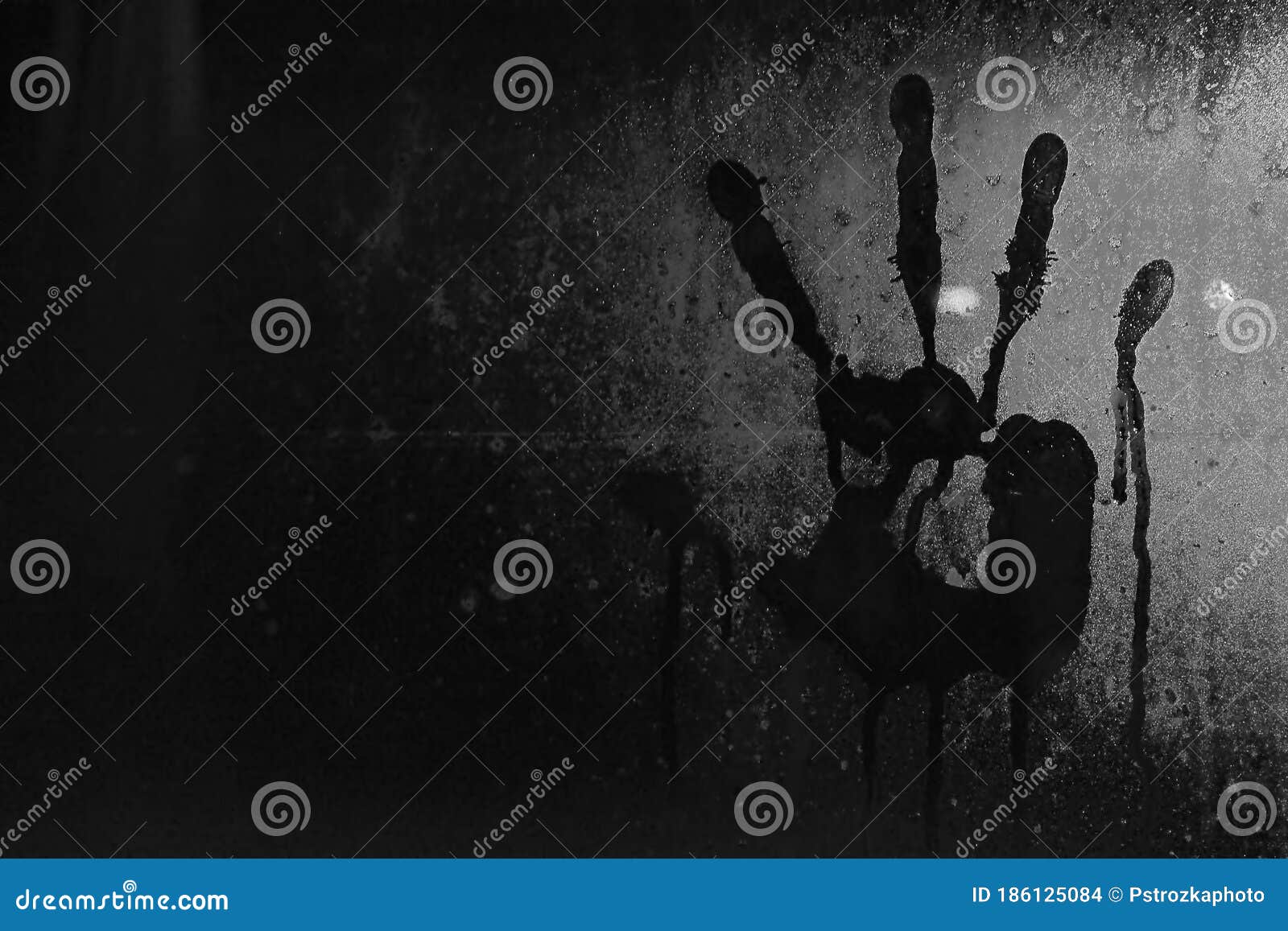 Handprint on a wet glass stock photo. Image of color - 186125084