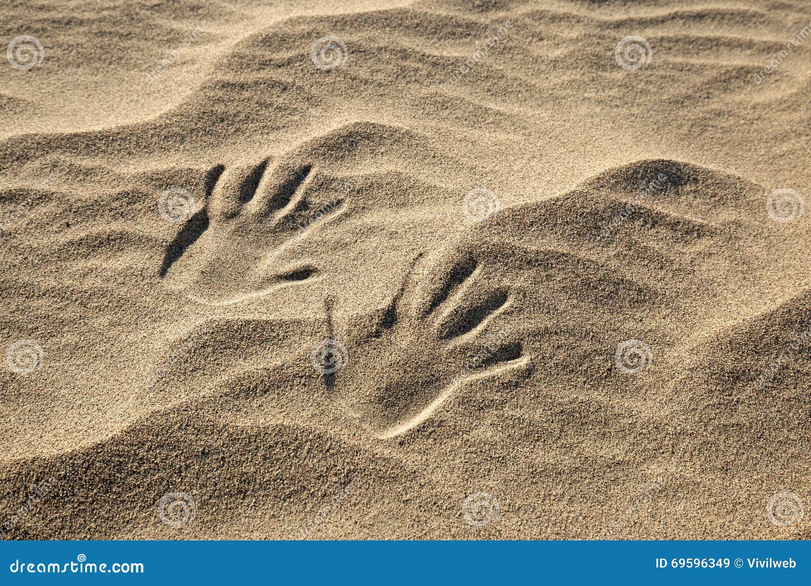 Handprints in the sand stock image. Image of sandy, dune - 69596349