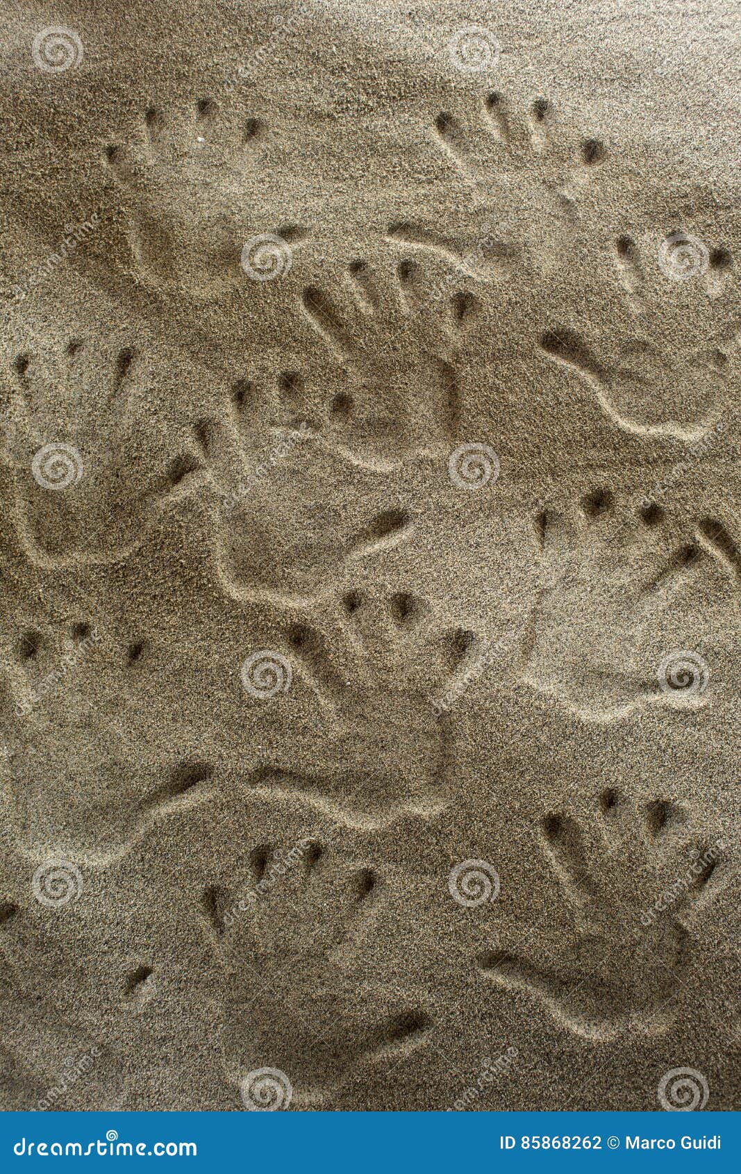 Handprints in the Sand stock photo. Image of human, sign - 85868262