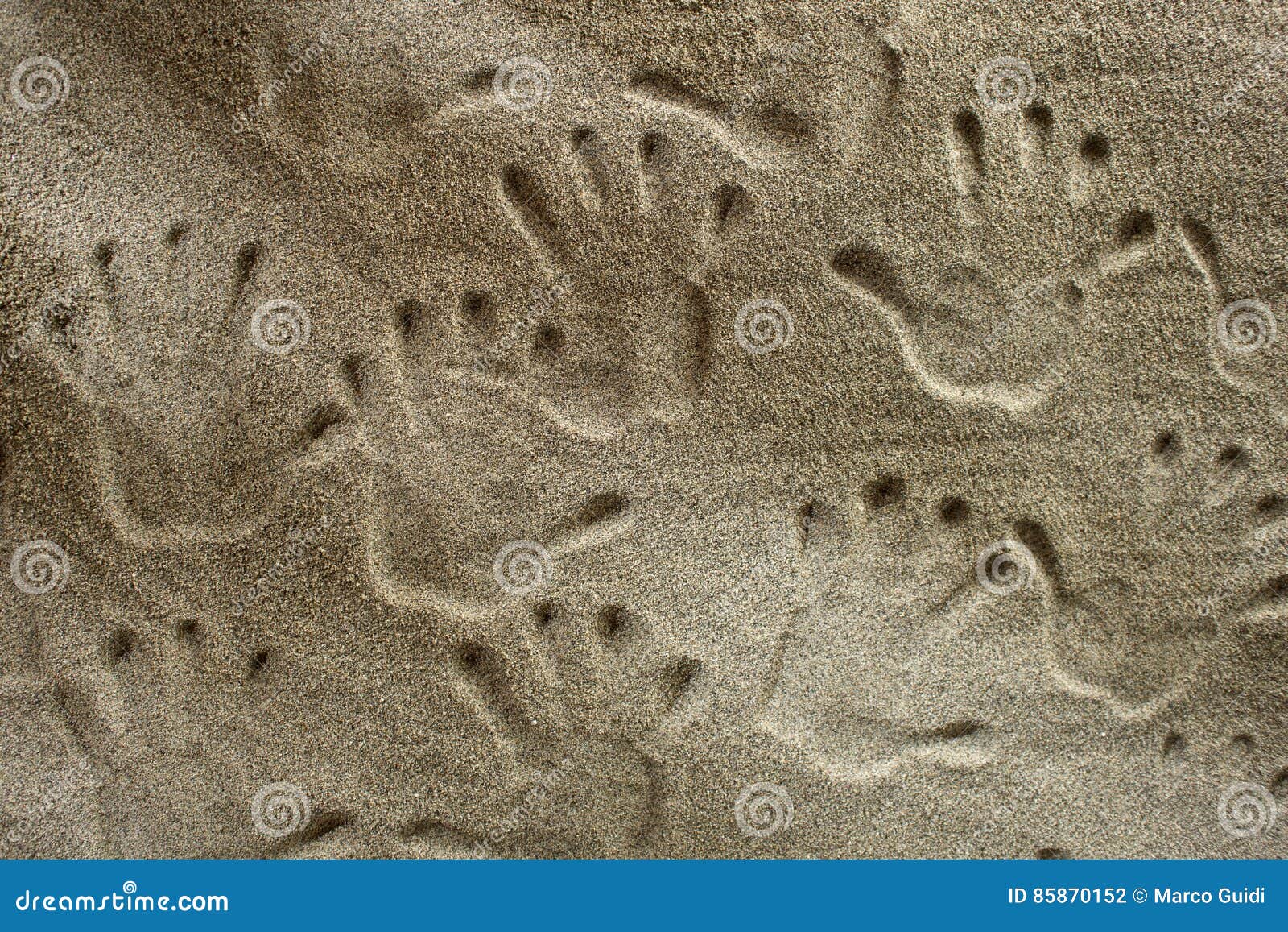 Handprints in the Sand stock photo. Image of natural - 85870152