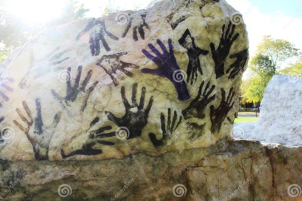 Handprints on the stone stock photo. Image of imprints - 77670998